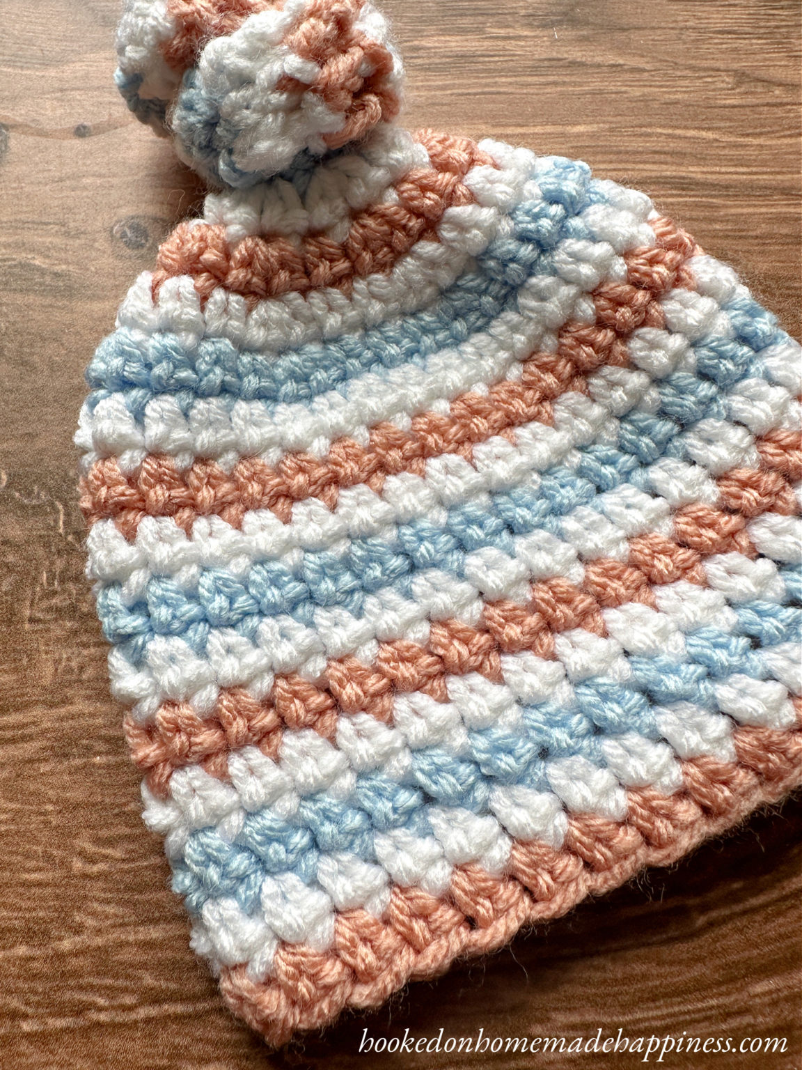 Top Knot Baby Beanie Crochet Pattern - Hooked on Homemade Happiness